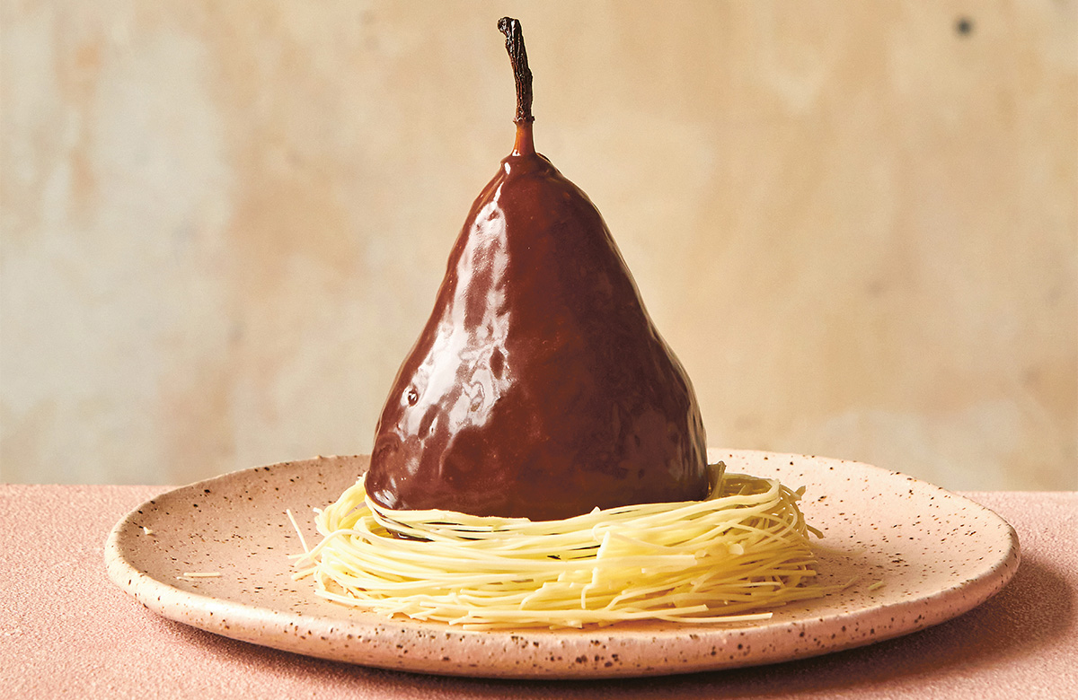 Poached pears with ginger-chocolate ganache in white chocolate nests ...
